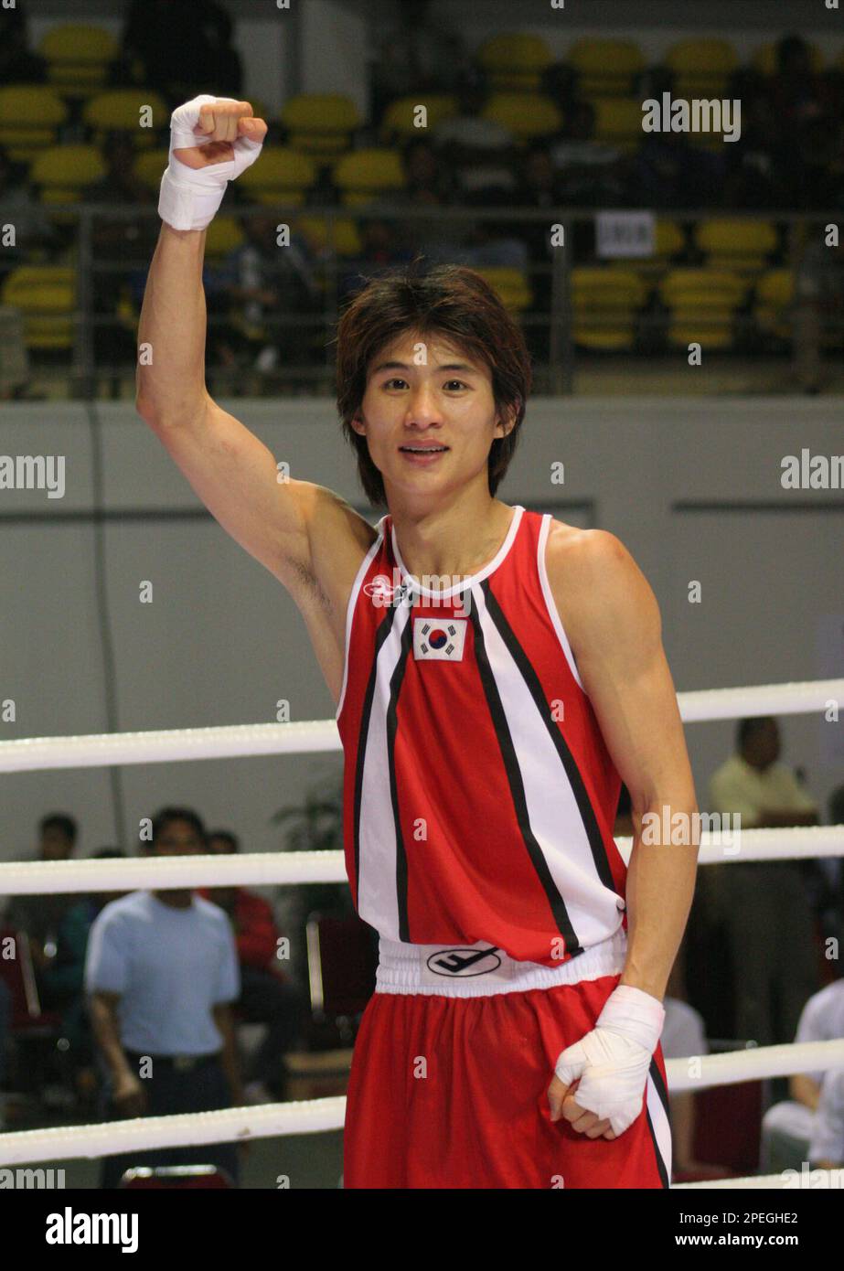 South Korean boxer Lee Ok Sung celebrates his victory in the President ...