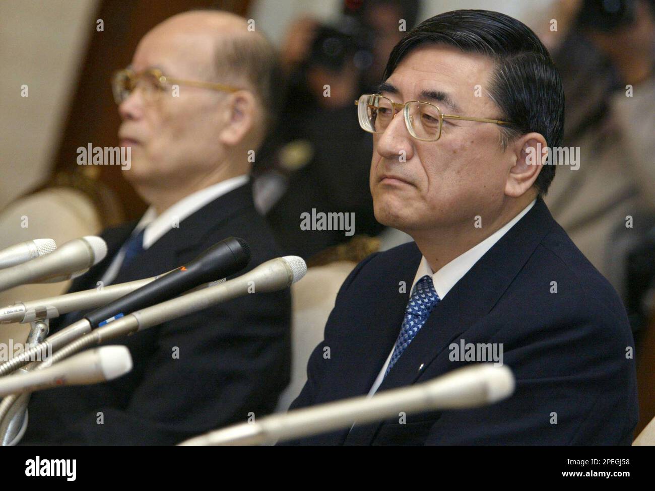 Ken Yamaguchi, right, doctor of Japan's Princess Takamatsu, grimaces ...