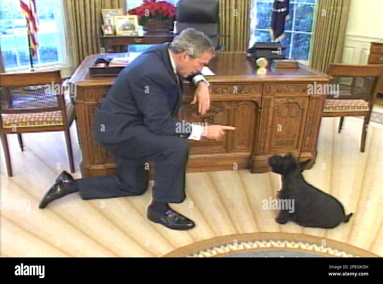 In this video image released by the White House, President Bush talks ...