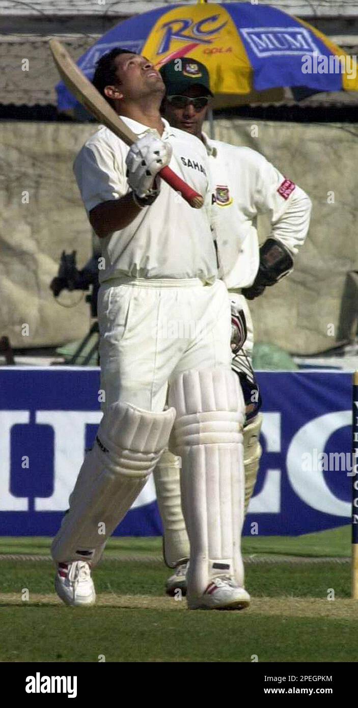 Indian batsman Sachin Tendulkar reacts after reaching his double ...