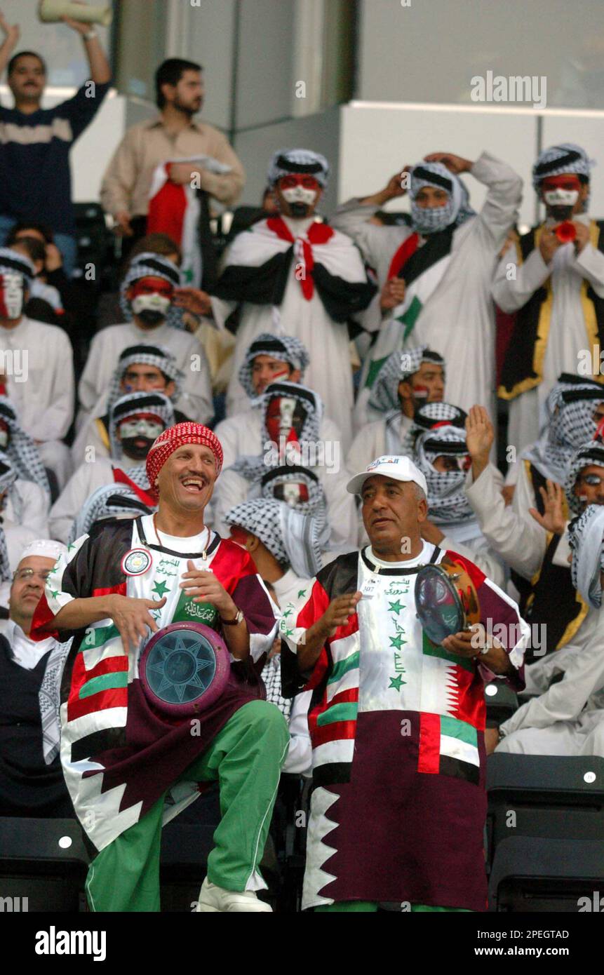 Iraqi fans cheer their team during their teams match against Oman 17th ...