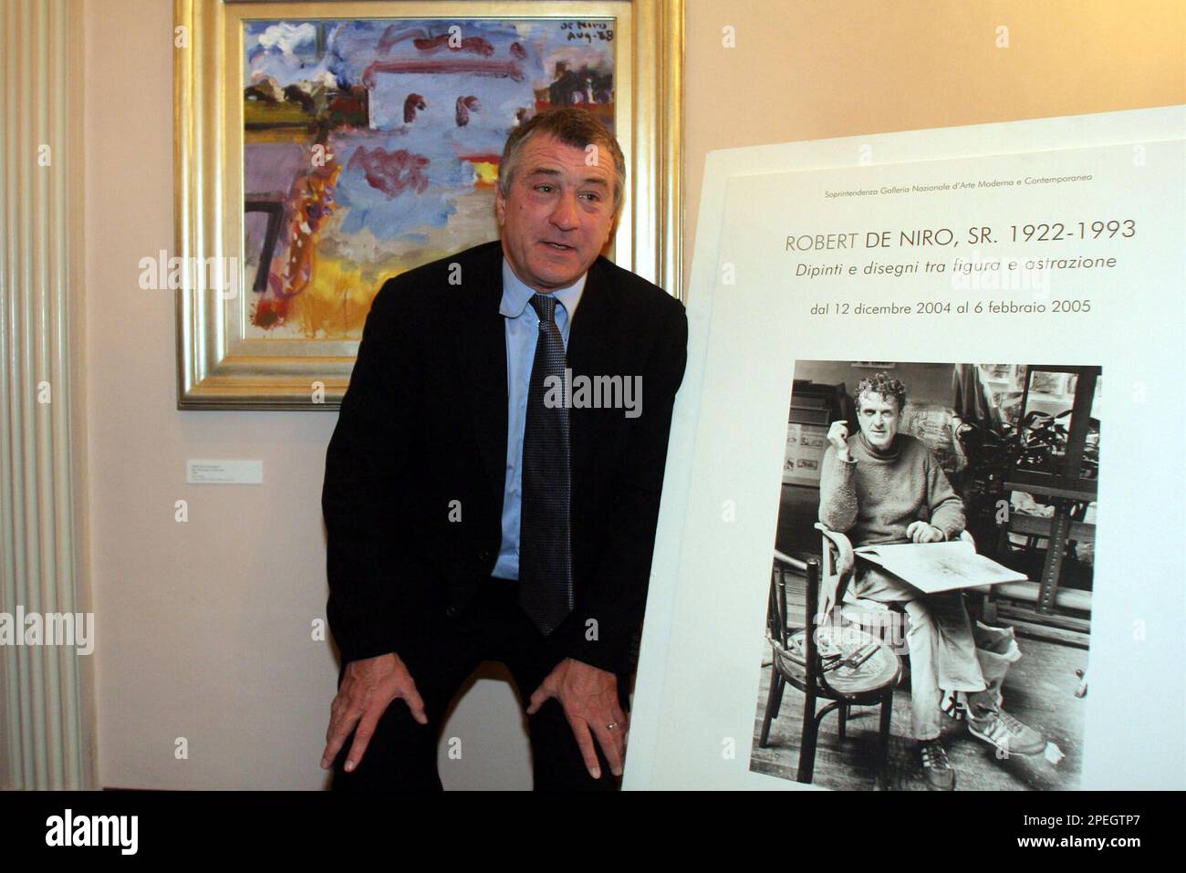 US movie star Robert De Niro stands near a banner presenting his father ...