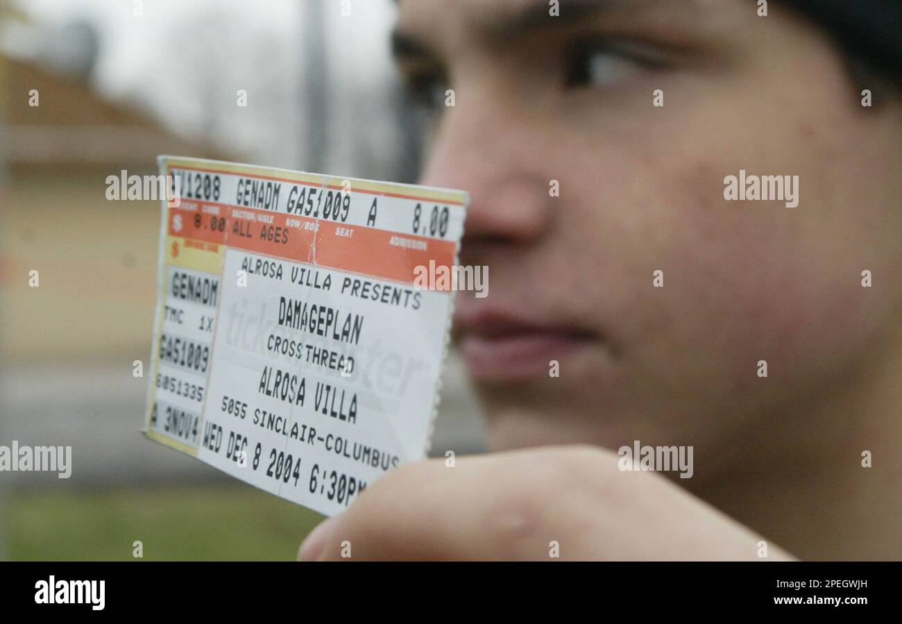 Damageplan fan Jeremy Spencer displays his ticket outside the Alrosa ...