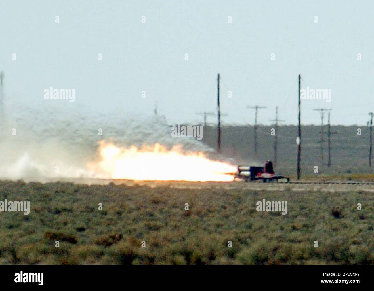 The Sonic Wind 2004 rocket sled picks up speed during a reenactment ...