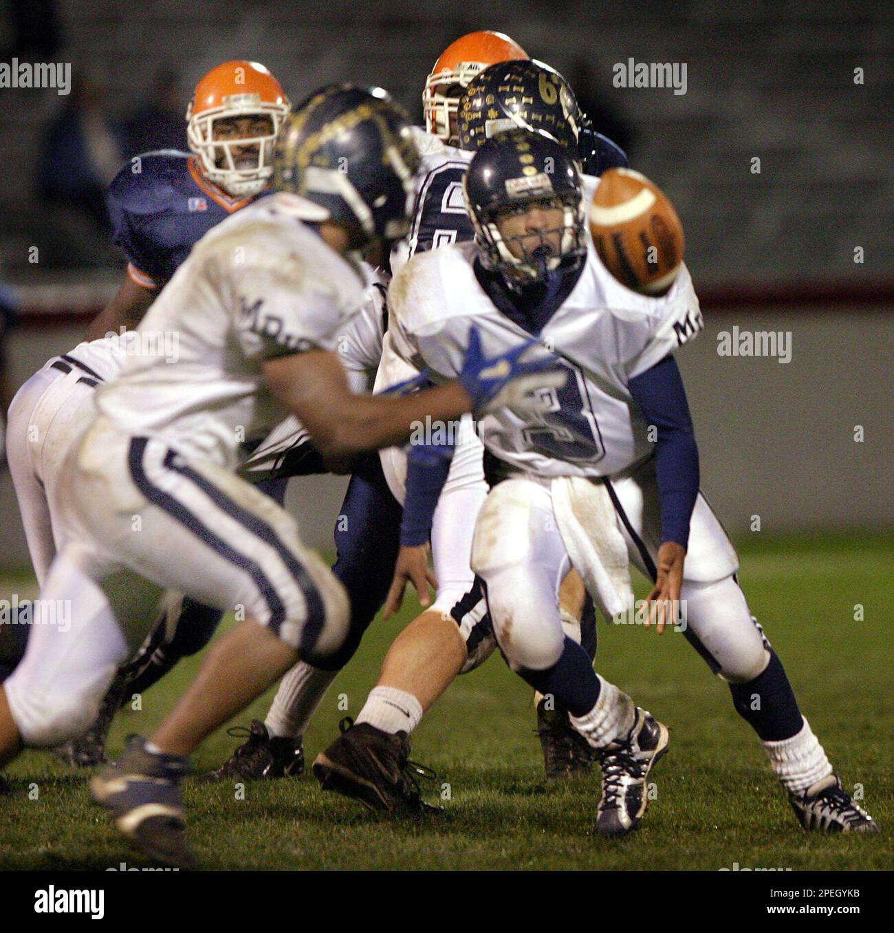 Meadowbrook quarterback Christopher Walker (3) tosses the ball to ...