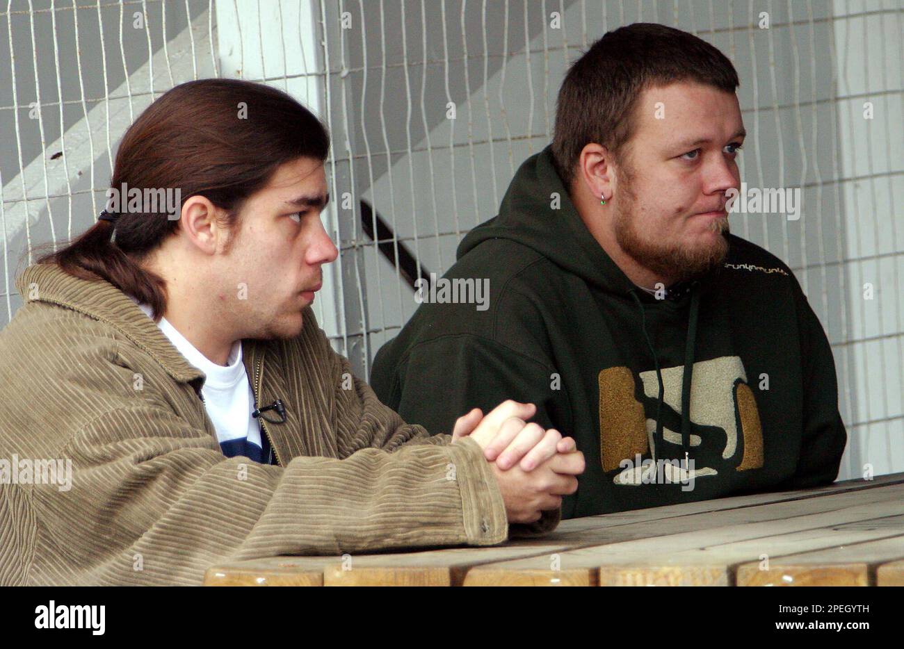 Dave Johnson, left, and Jeramie Brey talk Thursday, Dec. 9, 2004 in ...