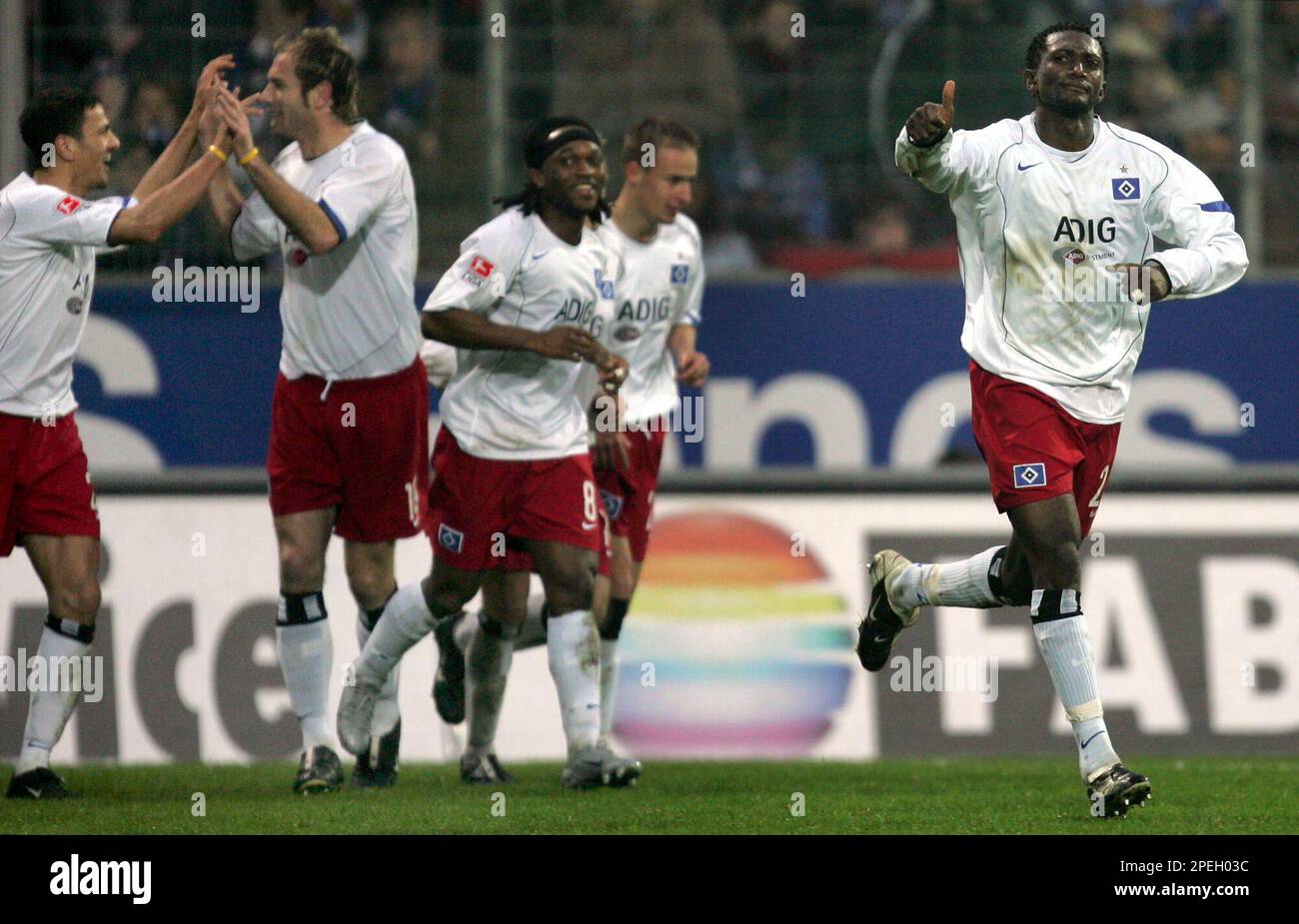 Hamburg's scorer Collin Benjamin from Namibia, right, gives thumbs-up ...