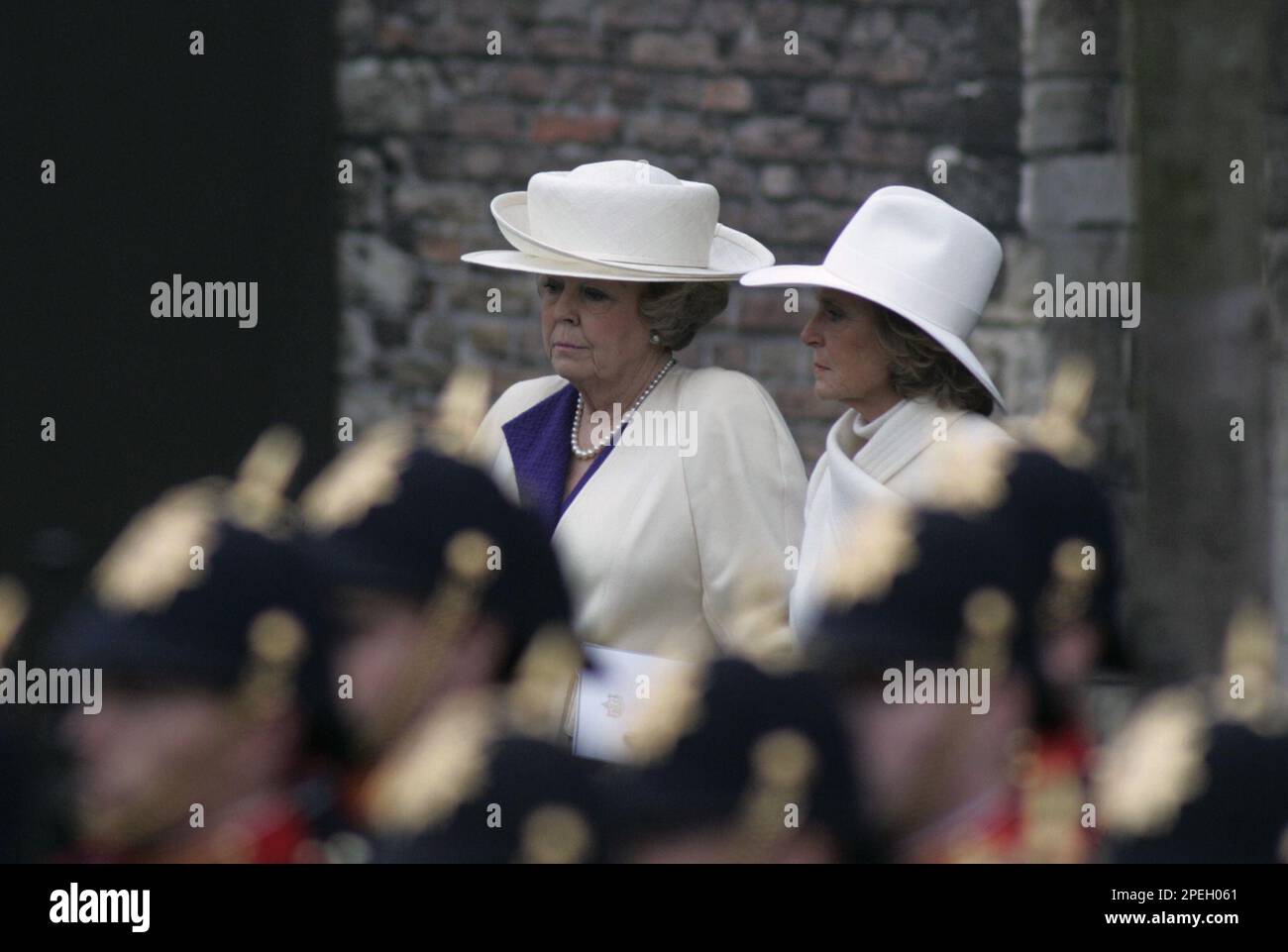 Dutch Queen Beatrix, left, and her sister Princess Irene, right, leave ...