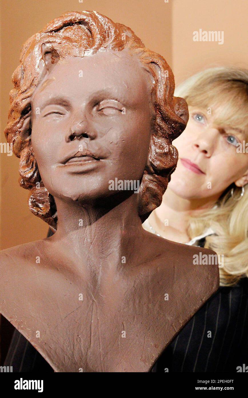 A visitor looks at a chocolate bust of Marilyn Monroe during the ...