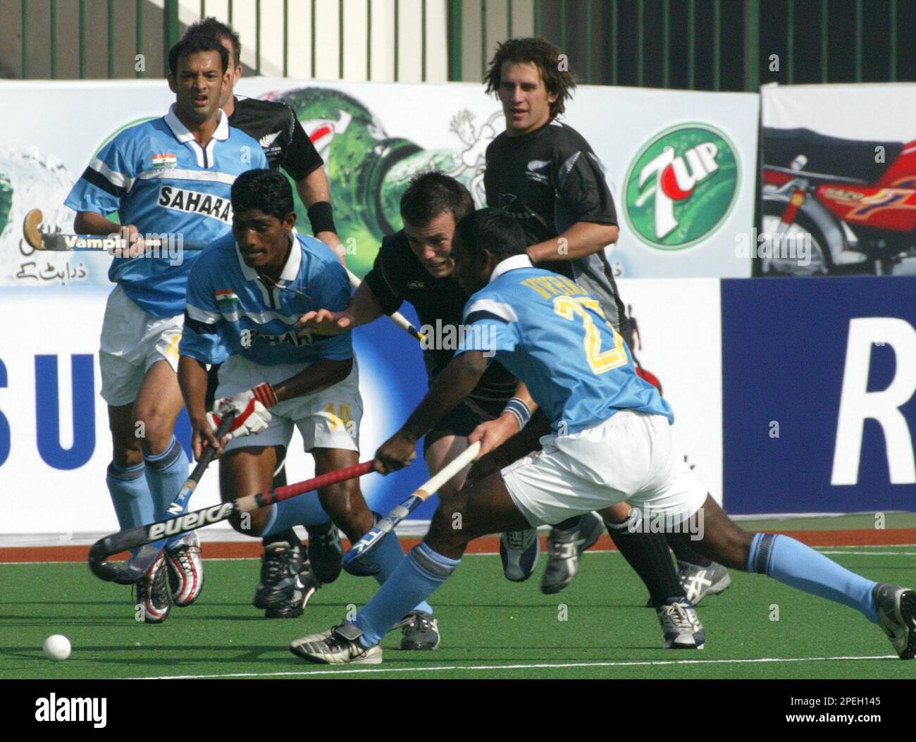 New Zealand's attacker Lloyd Stephenson, center, is sandwitched by ...