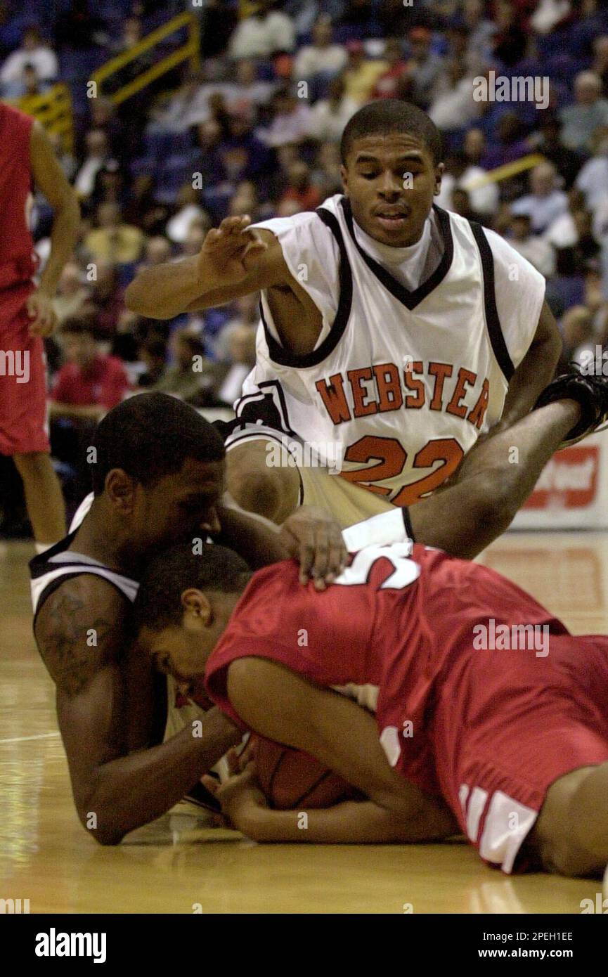 Homewood-Flossmoor's Carl Hayes, front, fights for a loose ball with ...