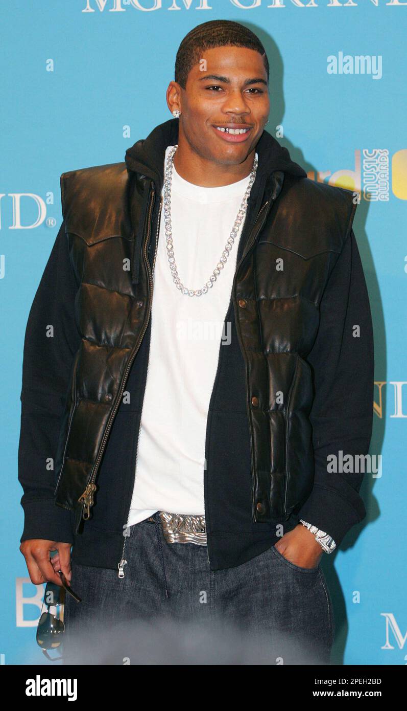 Rap artist Nelly poses for photographers during The 2004 Billboard ...
