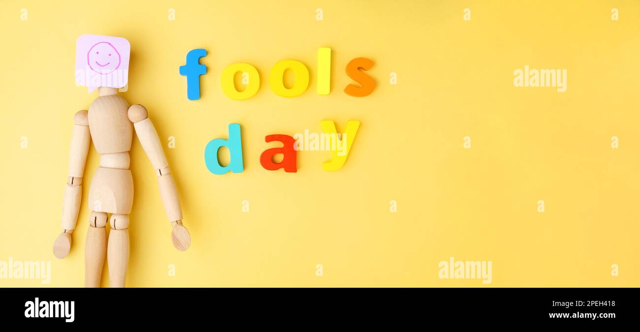 Surprise symbol yellow background. April fool. Joke with laughing face ...