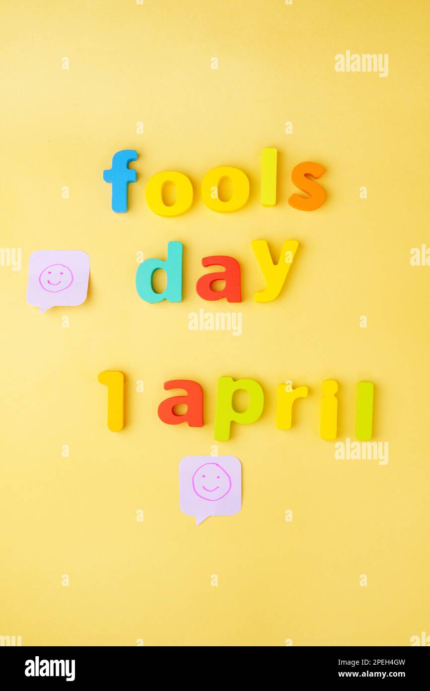 Yellow background laughing cartoon faces with a smile fools day, April ...