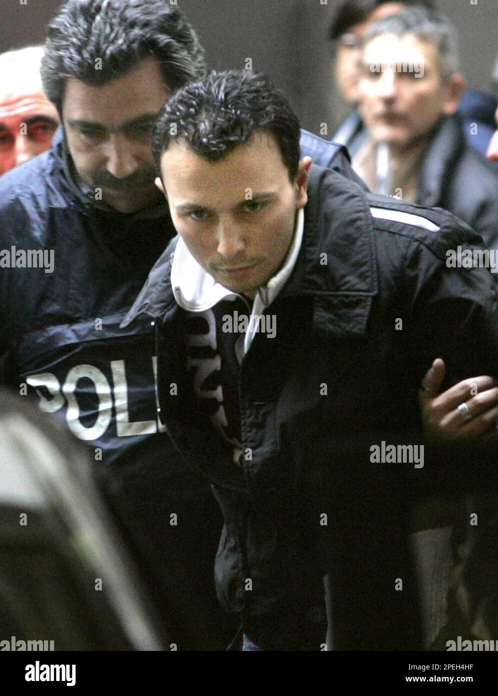 Ciro Di Lauro, son of the alleged mobster boss Paolo, is taken away by ...