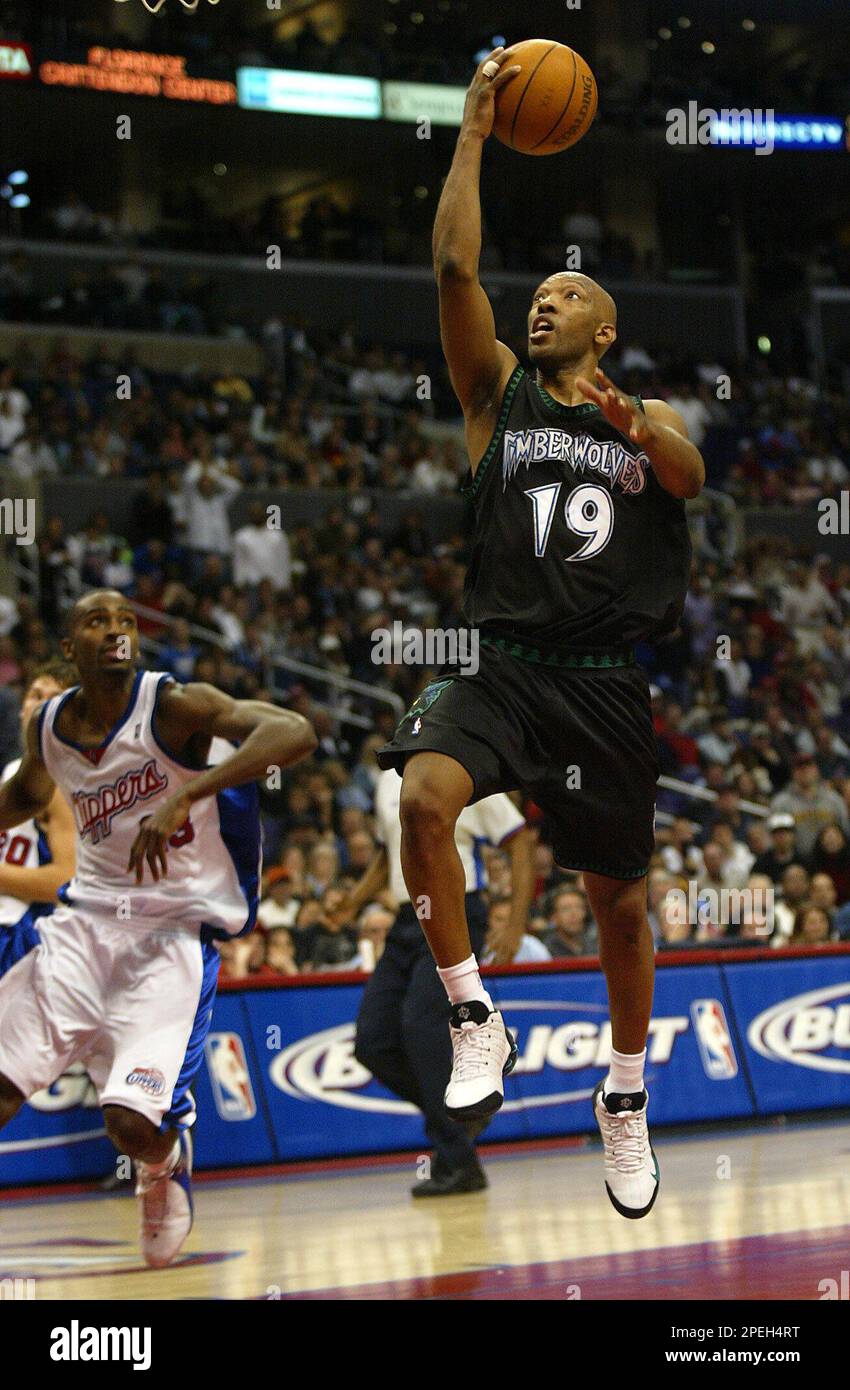 Minnesota Timberwolves Sam Cassell heads to the basket during overtime ...