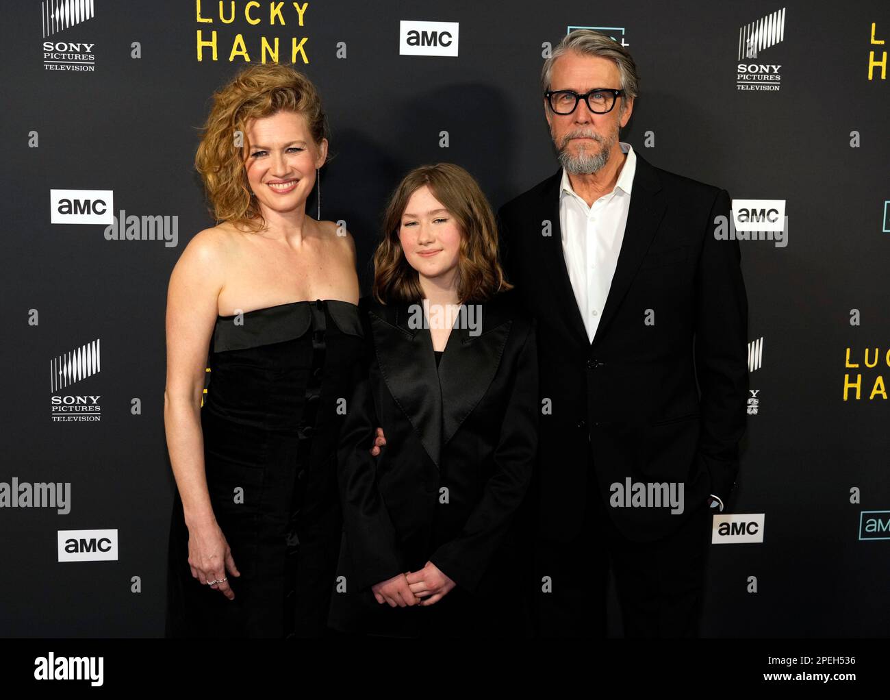 Mireille Enos, left, and husband Alan Ruck pose with their daughter ...