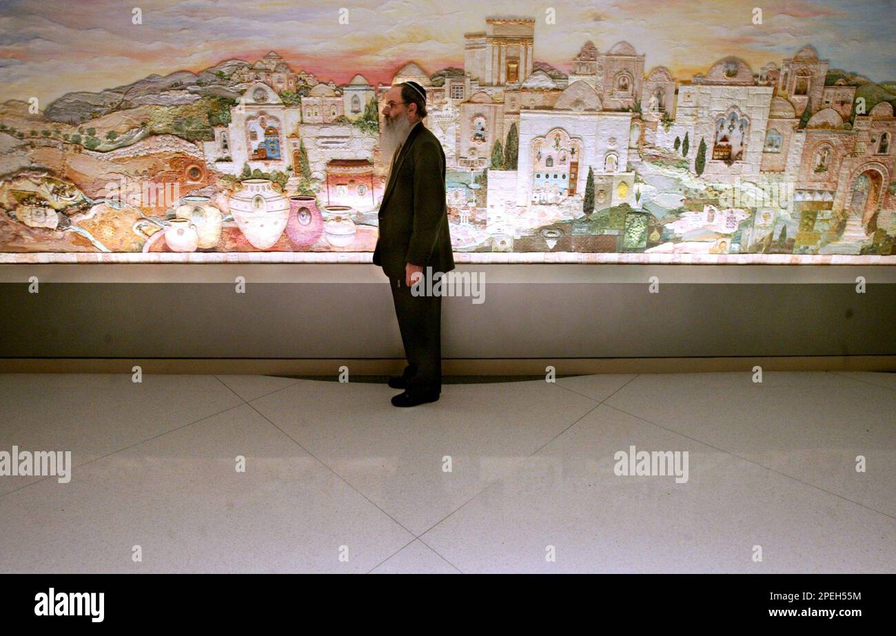 Artist Michoel Muchnik poses for a picture next to his acrylic and clay ...