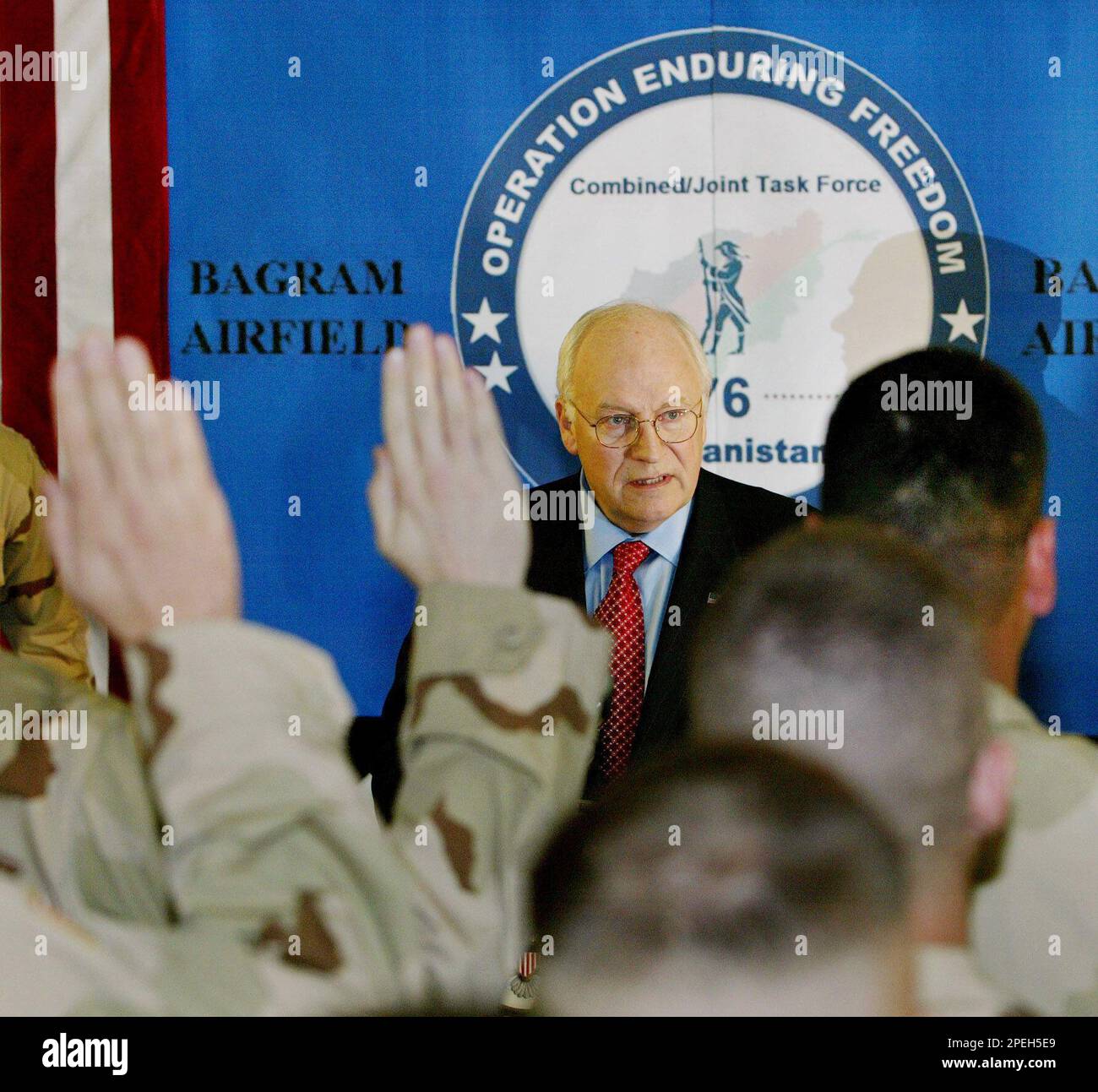 Vice President Cheney watches a U.S. military reenlistment ceremony for ...