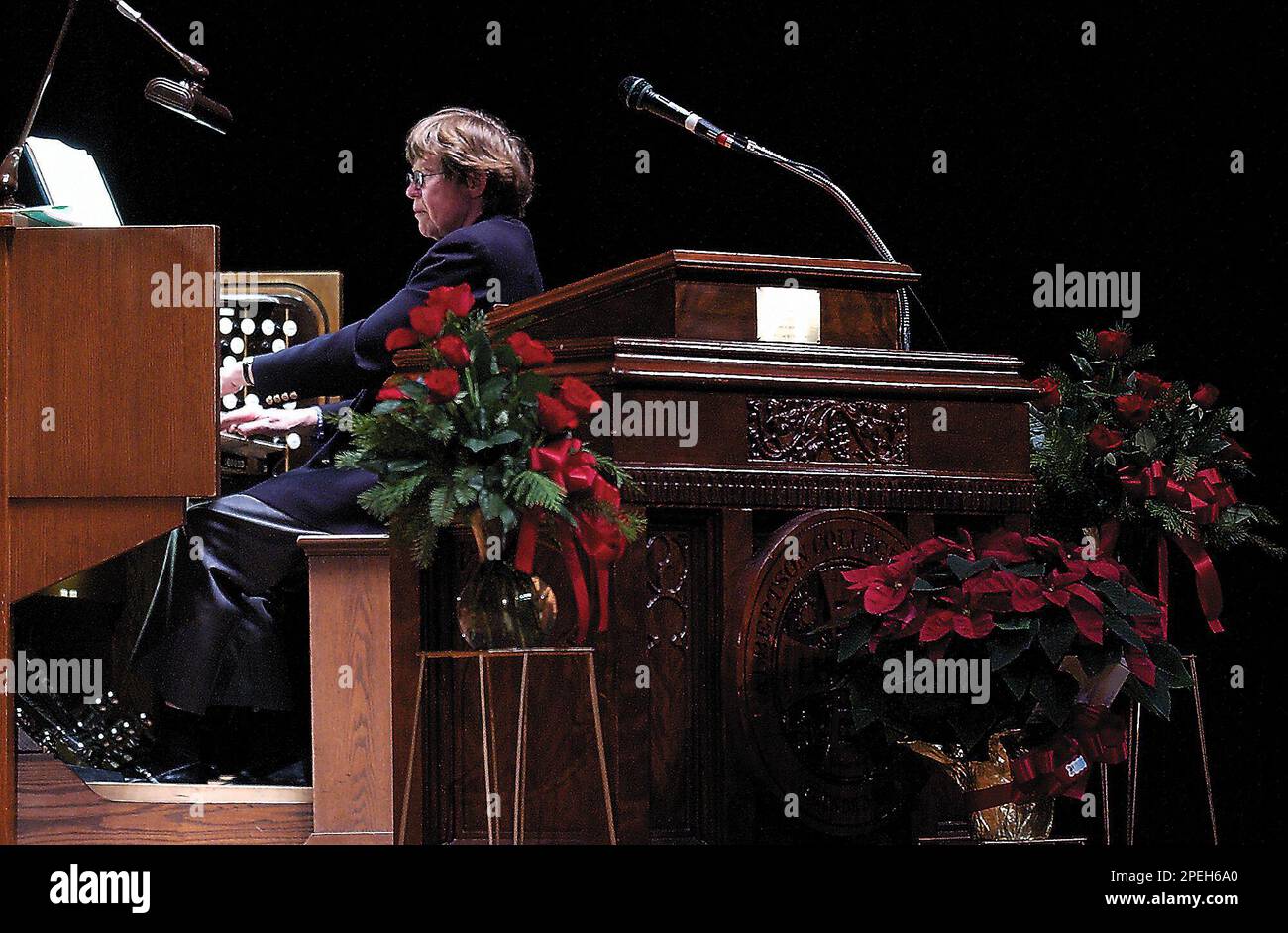 Sylvia Hunt plays the organ for the memorial at Jewett auditorium for ...