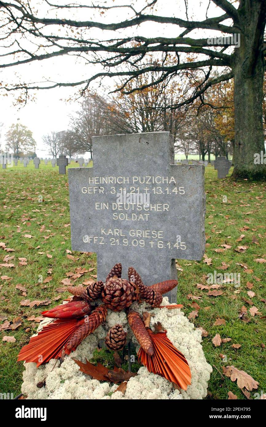 A wreath lays at the grave of a German WWII soldier in Recogne, Belgium ...