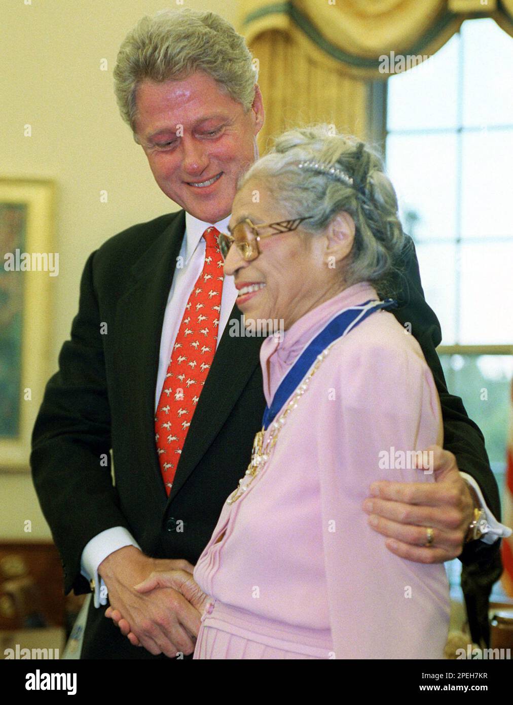 **FILE**President Bill Clinton stands beside Rosa Parks in the White ...