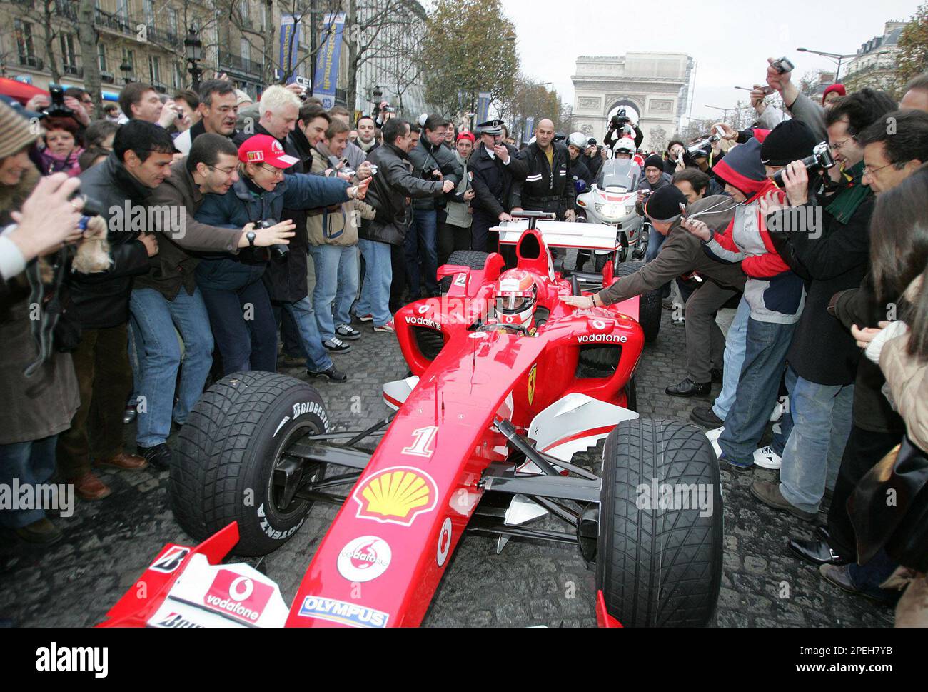 German Formula One champion Michael Schumacher drives down the Champs ...