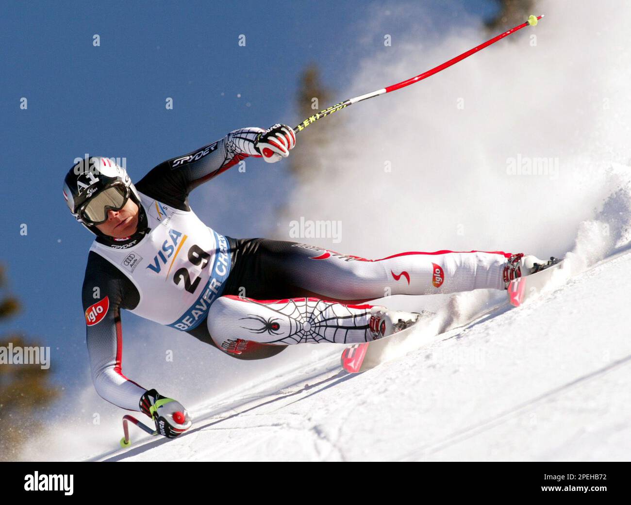 Austrian ski racer Michael Walchhofer races to a third place finish in ...