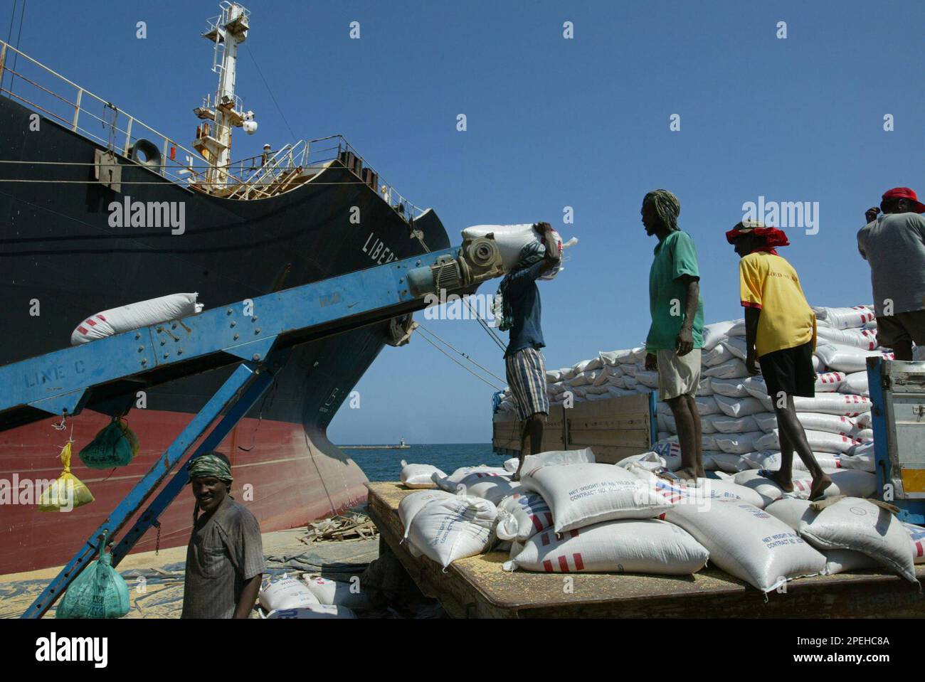 **ADVANCE TO GO WITH STORY ERITREA-DROUGHT** Workers unload food aid ...