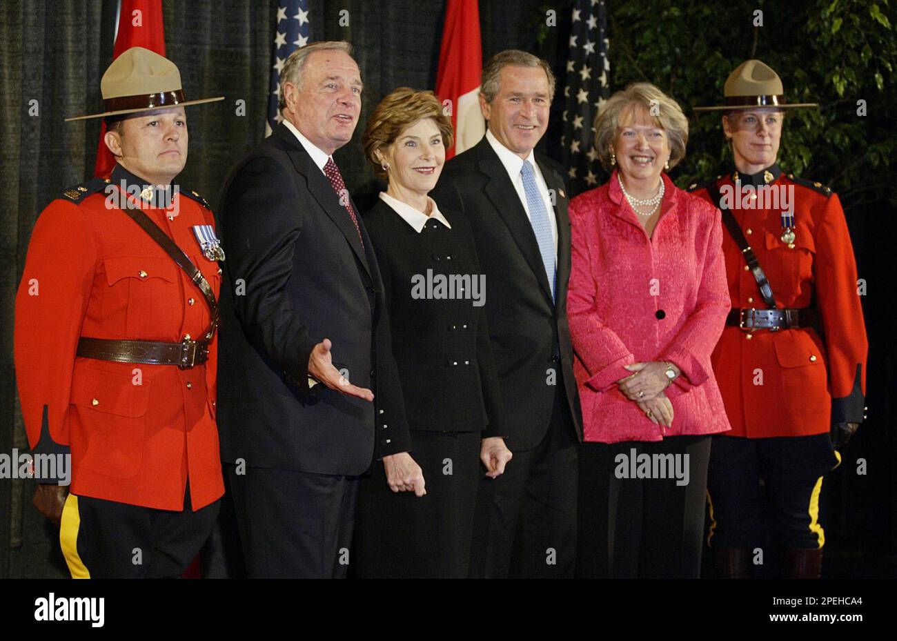President Bush with his wife Laura and Prime Minister Paul Martin with ...