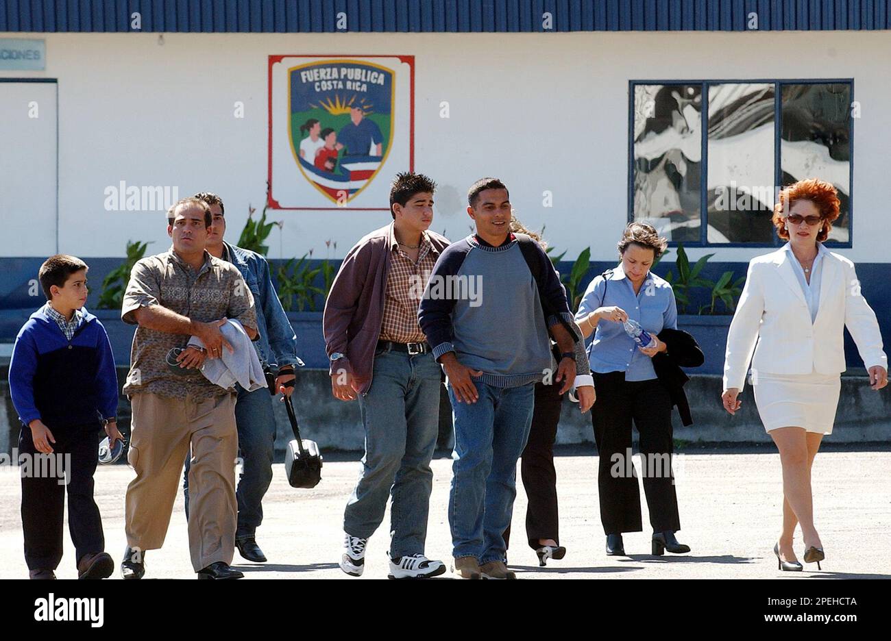 A group of twenty Cubans who have been held at the U.S. military base ...