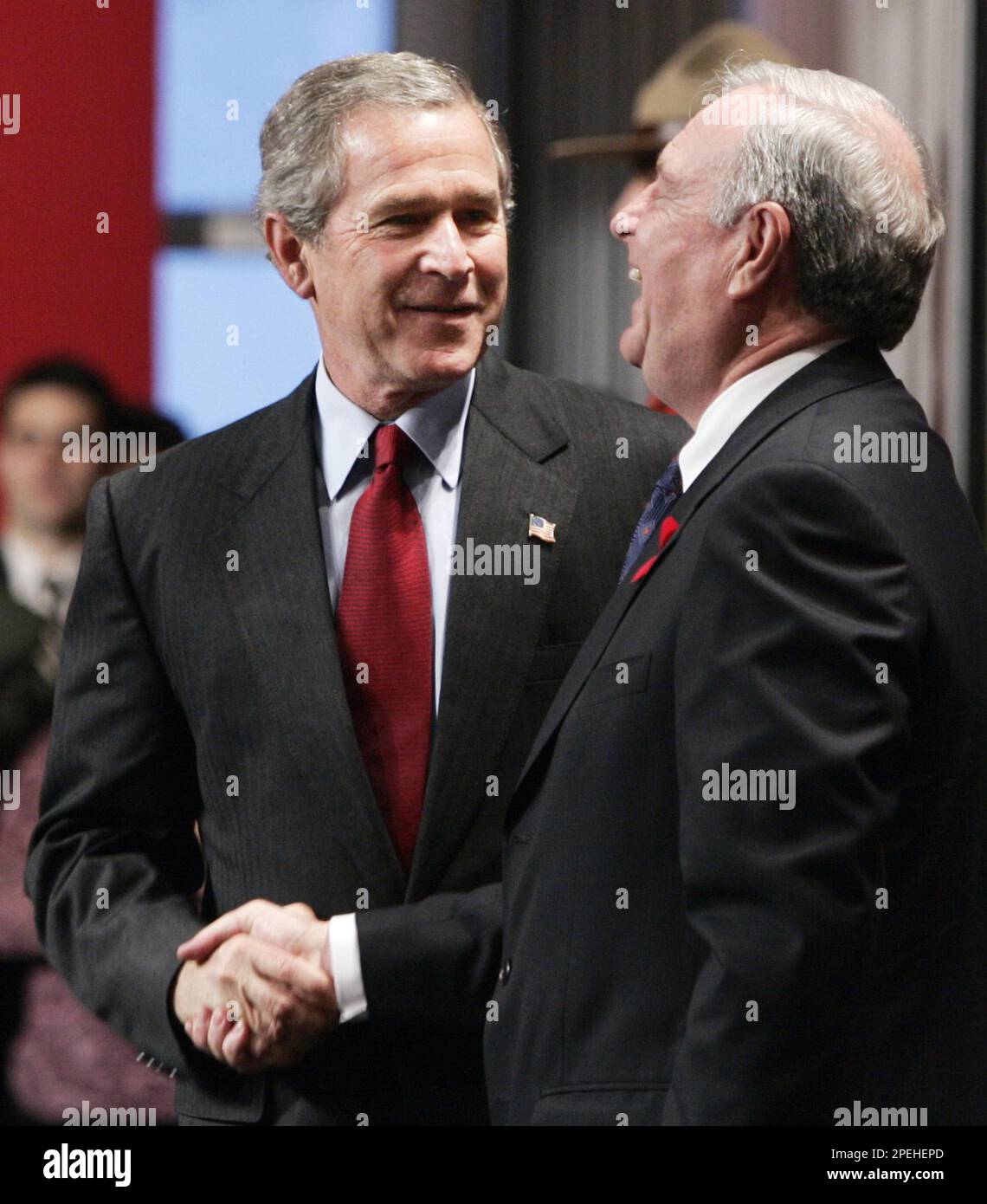 Canadian Prime Minister Paul Martin, right, laughs heartily as he ...