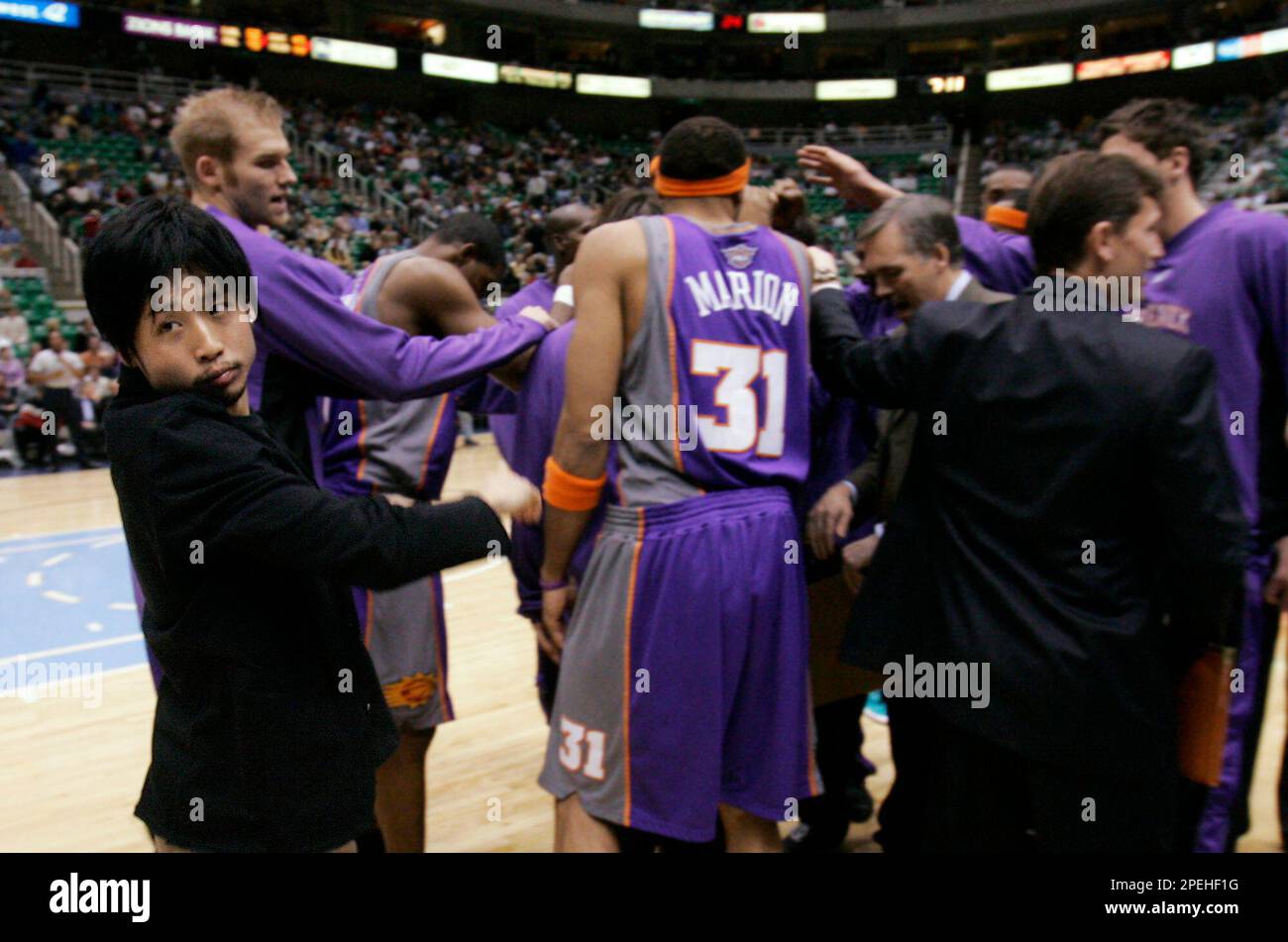 Phoenix Suns guard Yuta Tabuse, of Japan, participates in the team ...