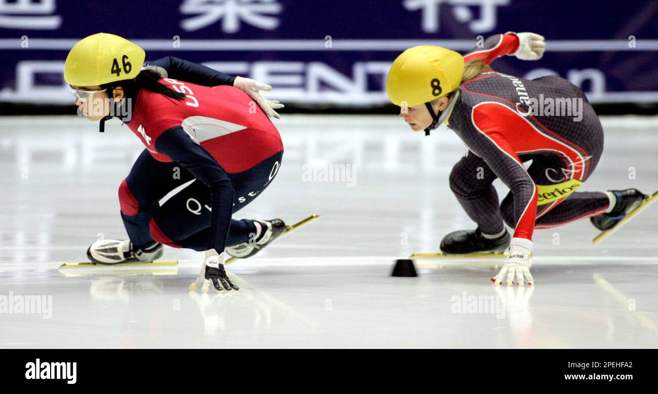 Hyo-Jung Kim of Fullerton, Calif., skates against Amanda Overland of ...