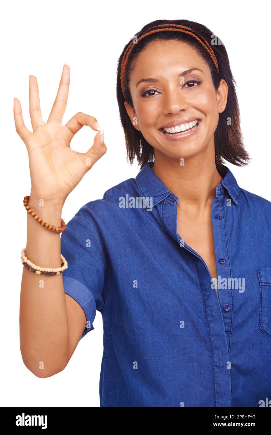 Everything is a-okay. An attractive young woman giving you the a-okay ...