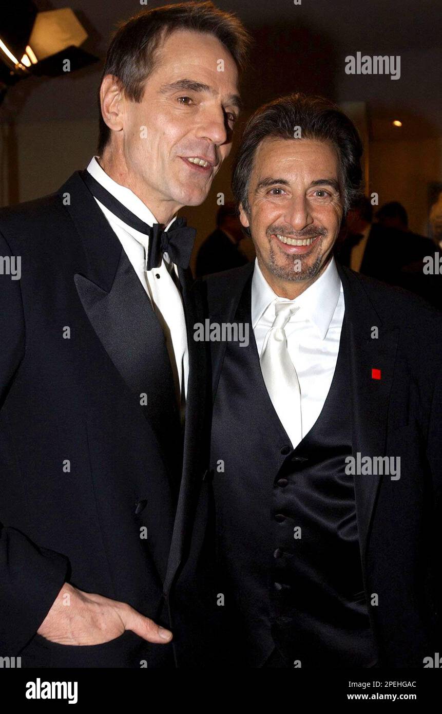 Actors Jeremy Irons, left, and Al Pacino wait to meet the Prince of ...
