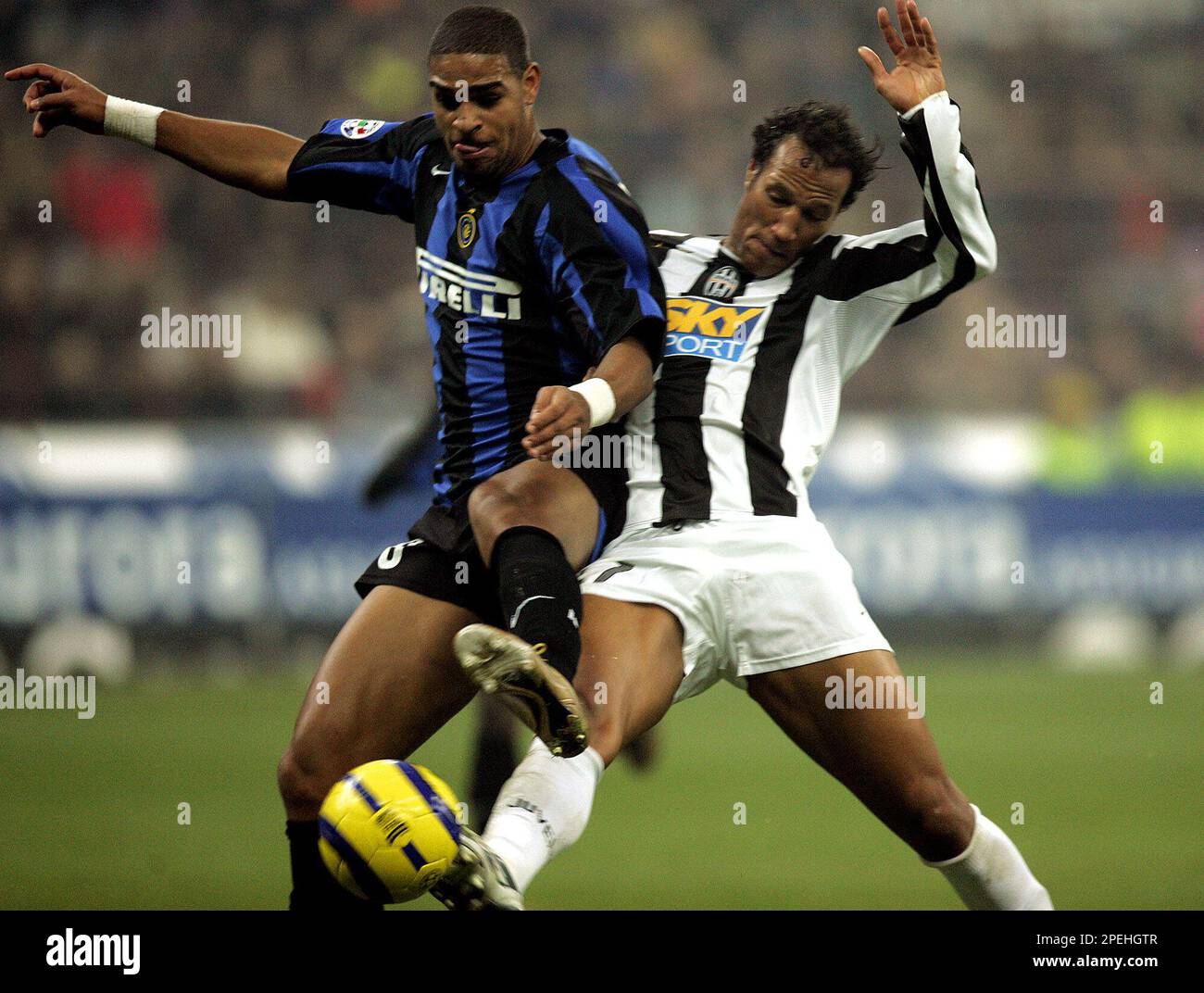 Inter of Milan forward Adriano, left, of Brazil, and Juventus defender ...