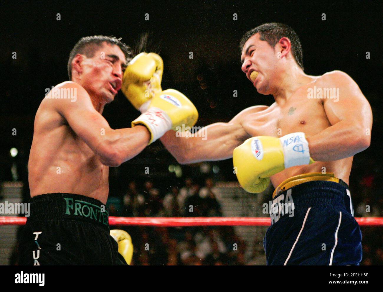 Erik Morales, left, of Mexico, and Marco Antonio Barrera, of Mexico ...