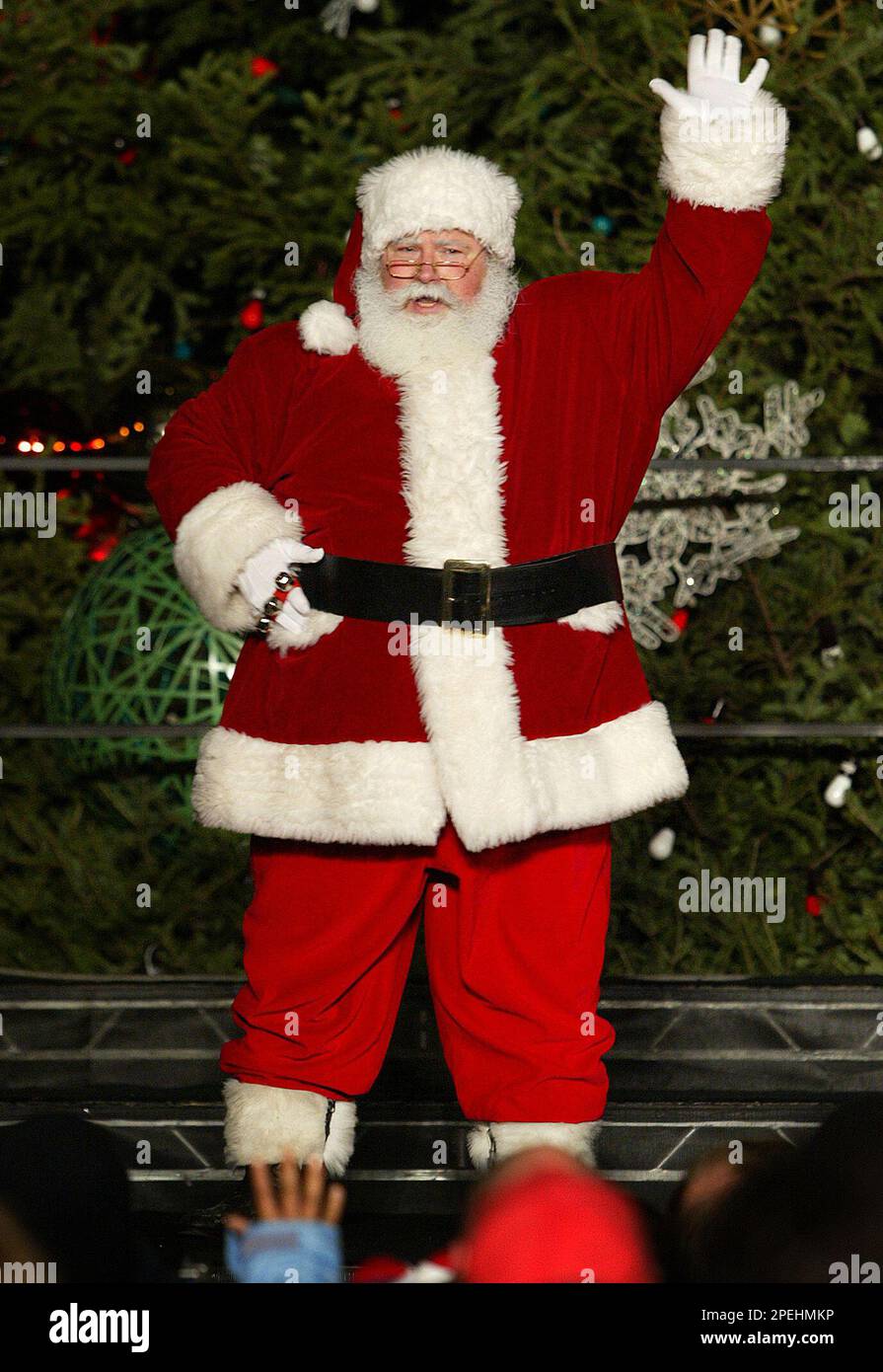 Santa Claus waves during the 91st annual city Christmas tree lighting ...