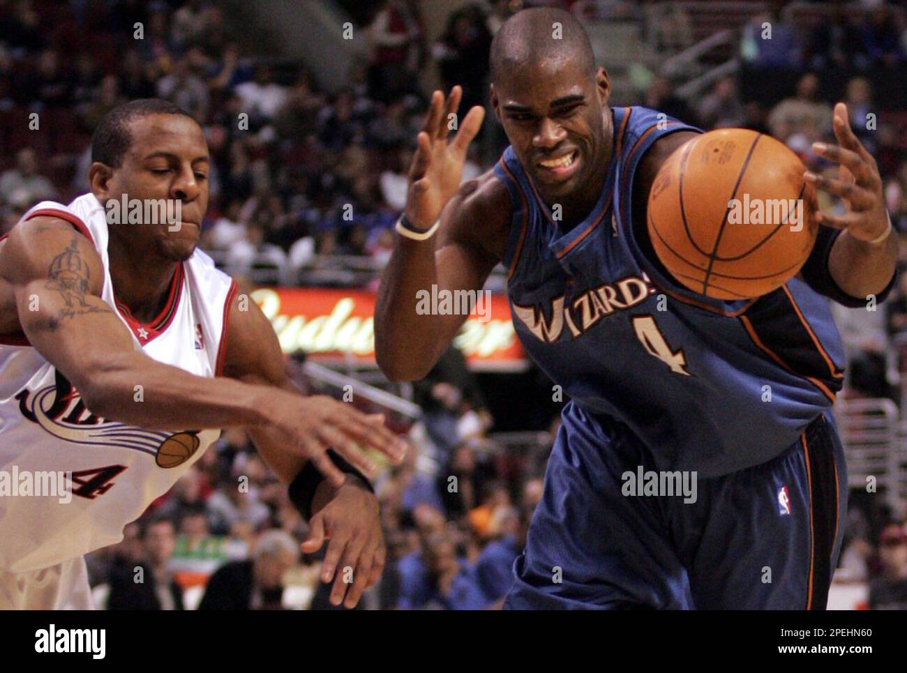Philadelphia 76ers' Andre Iguodala, left, knocks the ball away from ...