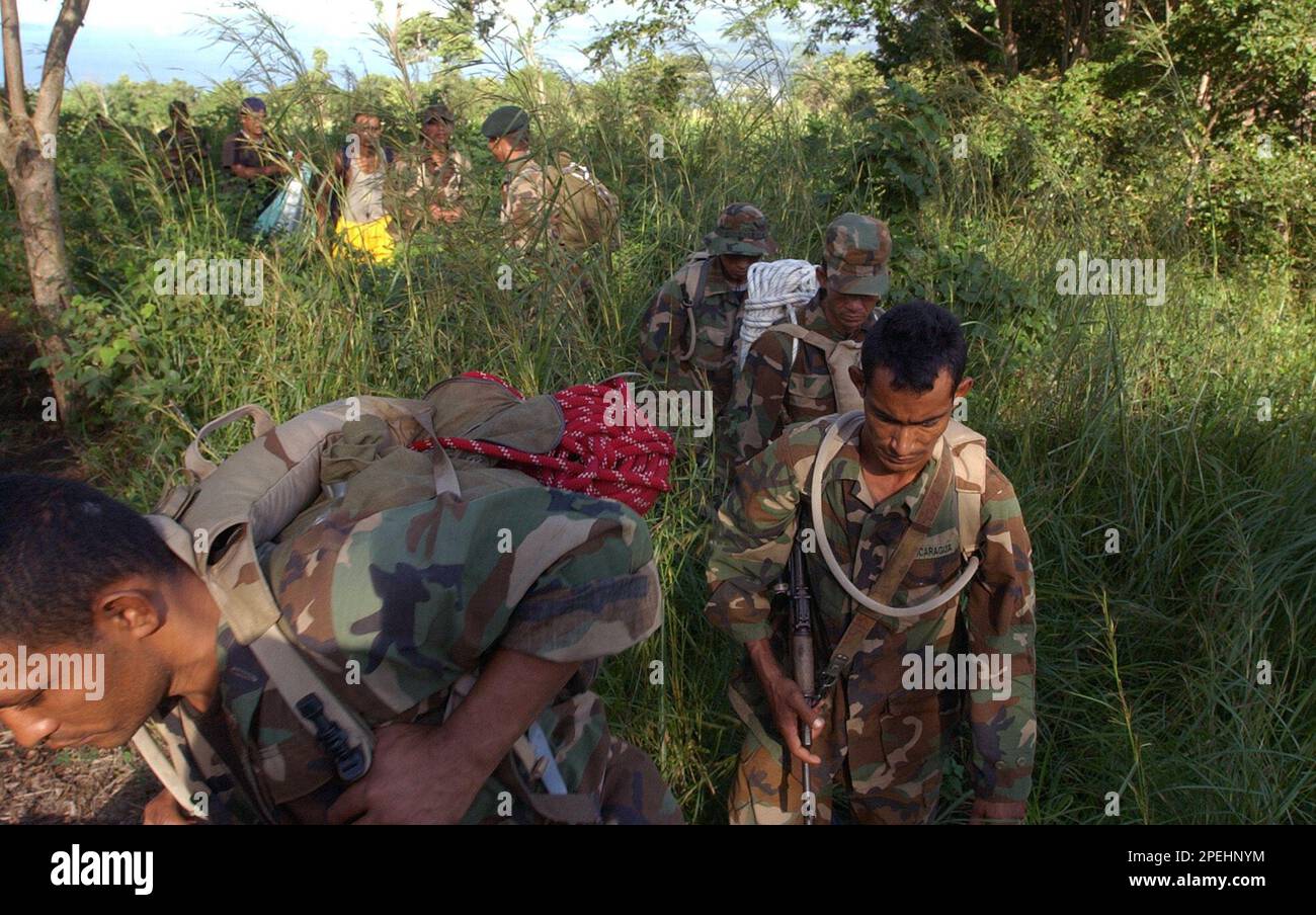 Members of the Nicaraguan army participate in search and rescue efforts ...
