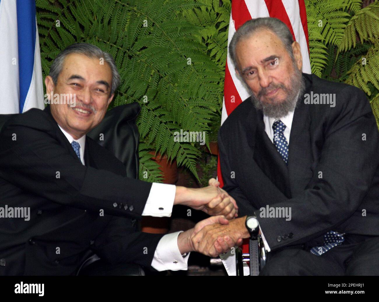 Cuban President Fidel Castro, right, and Dato Seri Abdullah Prime ...