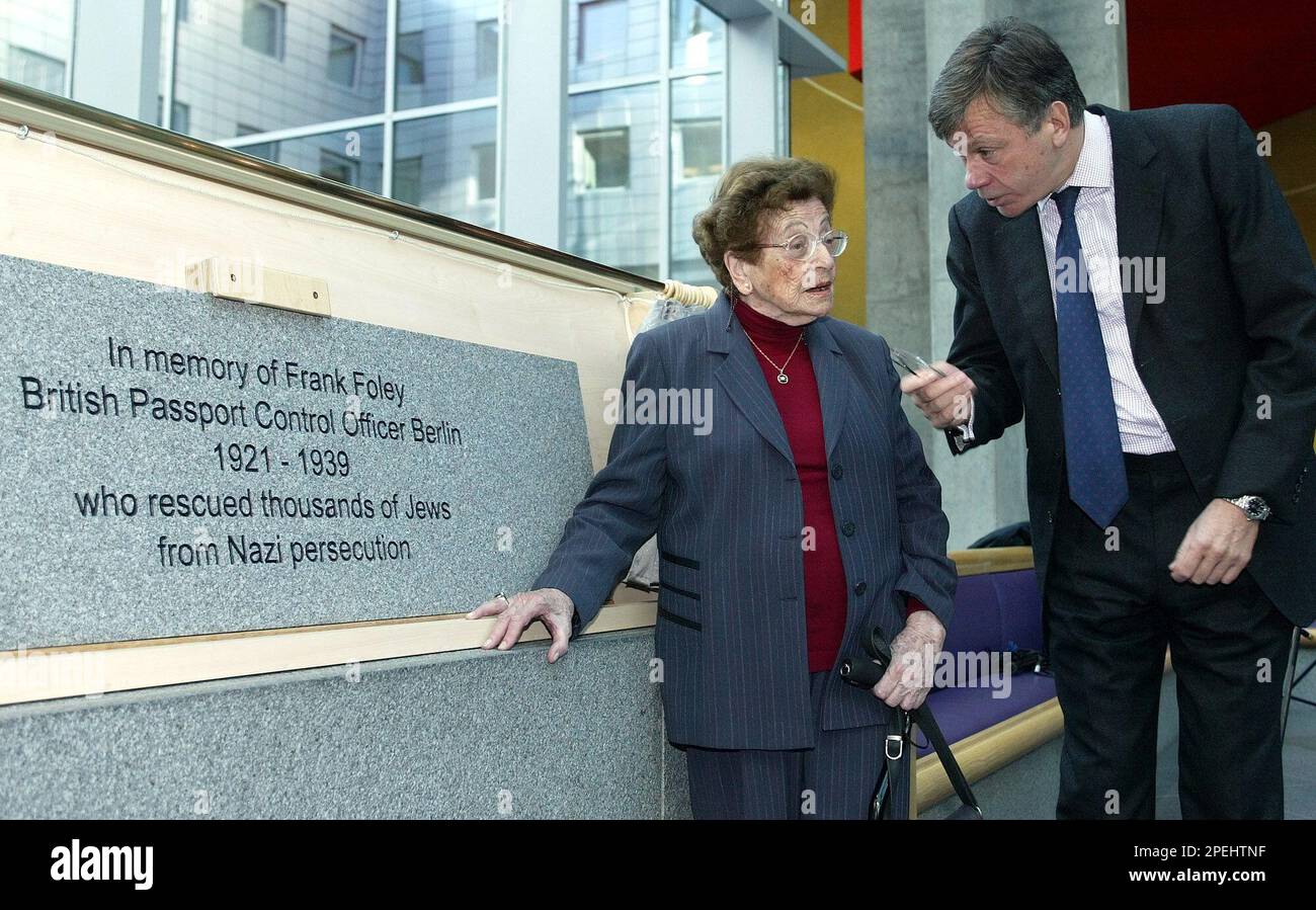 British ambassador Sir Peter Torry, right, explains to Elisheva Lernau ...