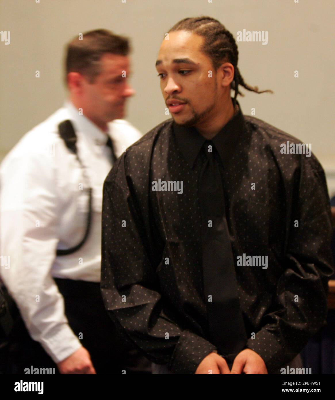 Joseph Cousin walks into a courtroom in his murder trial Tuesday, Nov ...