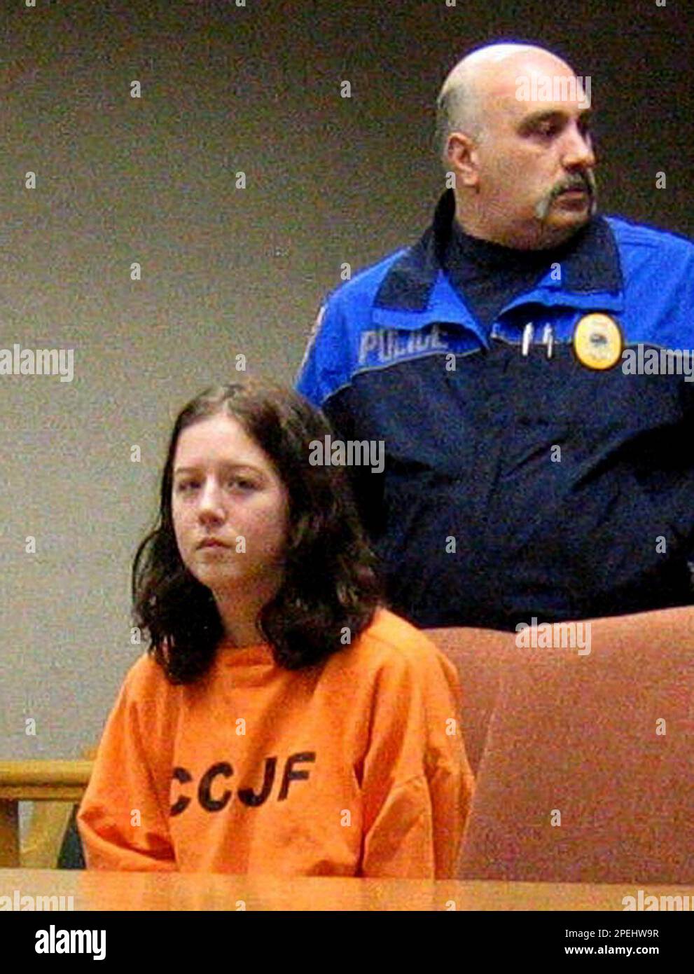 Rachelle Waterman, 16, left, sits in District Court in Craig, Alaska ...
