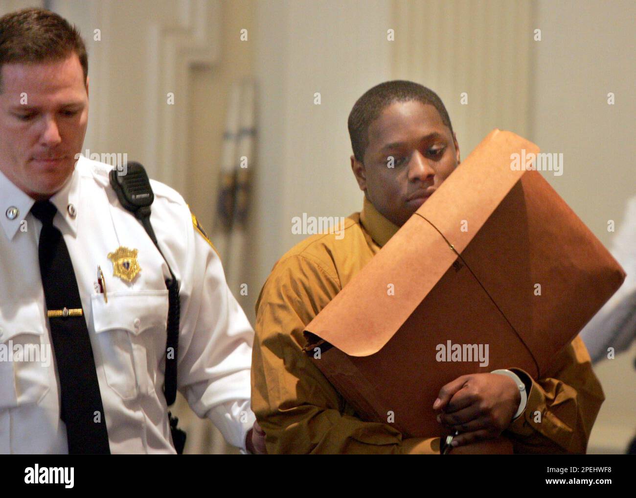 Marquis Nelson walks into a courtroom for his murder trial Tuesday, Nov ...