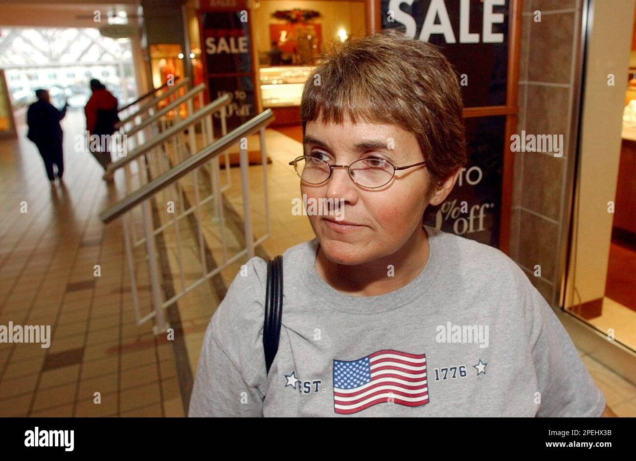 Susan Barnett of Bald Knob, Ark., leaves a store in a Little Rock, Ark ...