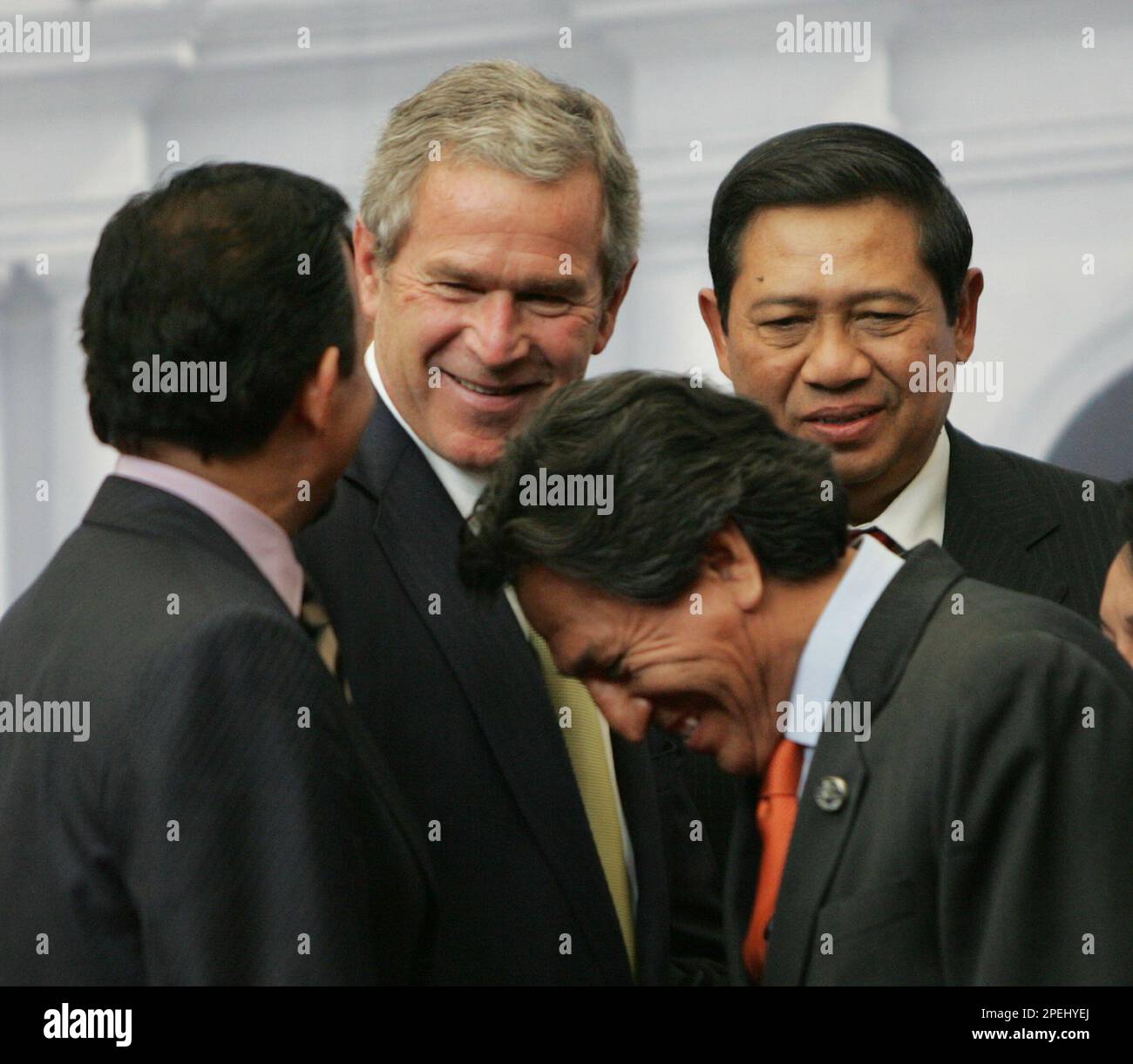 President George W. Bush, center, shares a smiles as after he attend ...