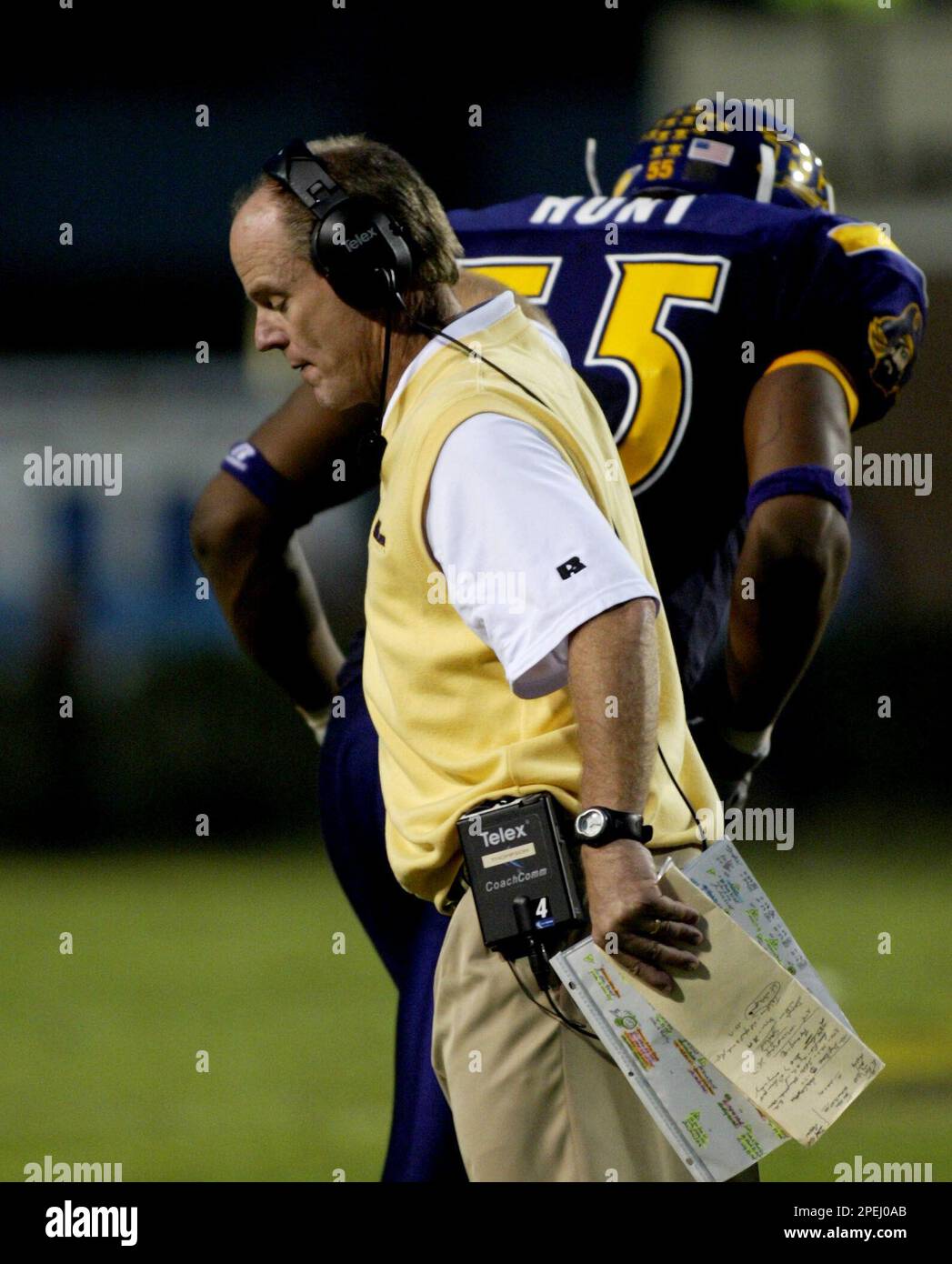 East Carolina coach John Thompson and Shauntae Hunt look down during ...