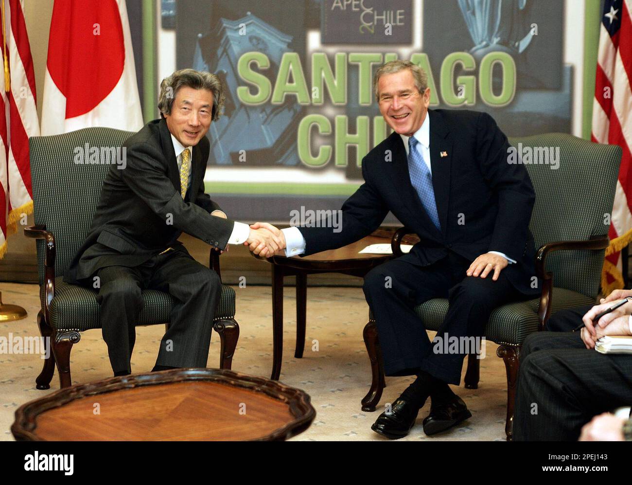 US President George W. Bush, right, greets Japanese Prime Minister ...